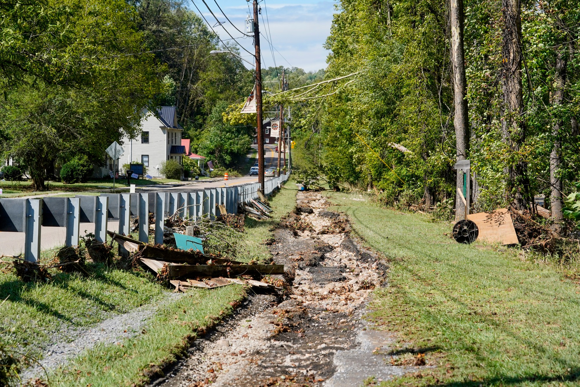 Floodwaters destroyed 18 trestles on the Creeper Trail and washed away much of the path. Now ...